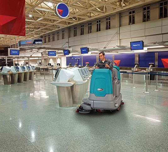 T12 Compact Battery Ride-On Floor Scrubber | Tennant Company