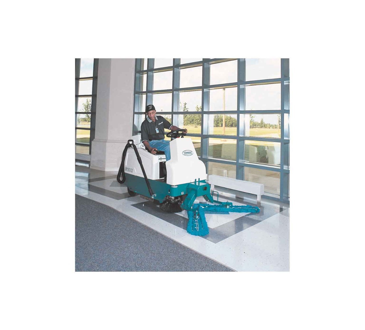 6100 Sub-Compact Ride-On Floor Sweeper | Tennant Company
